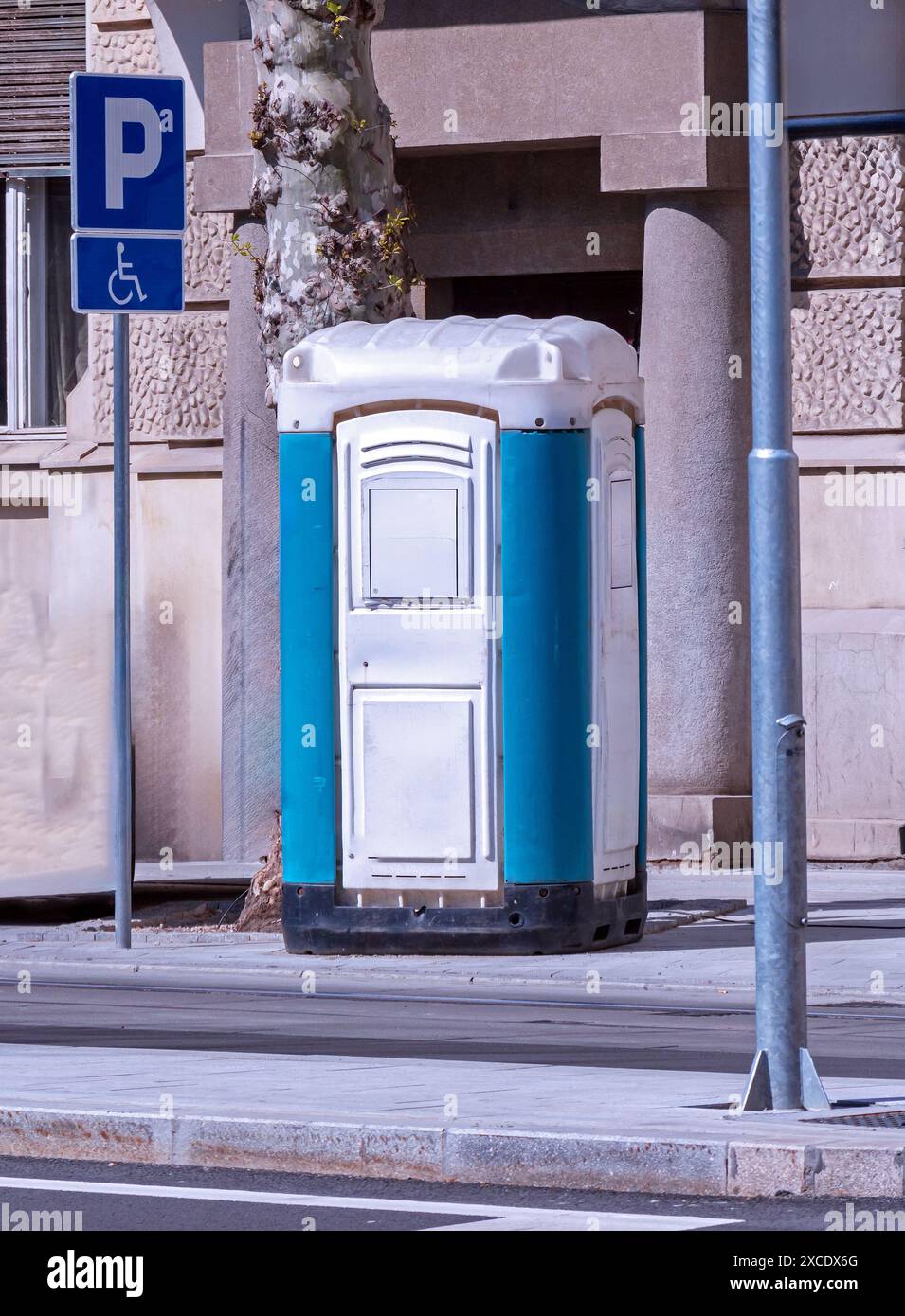 Portable mobile public toilet outside on urban city street Stock Photo ...