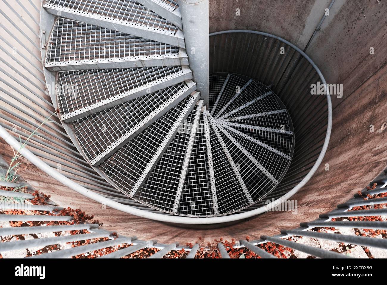 Exterior metal spiral staircases going underground Stock Photo - Alamy