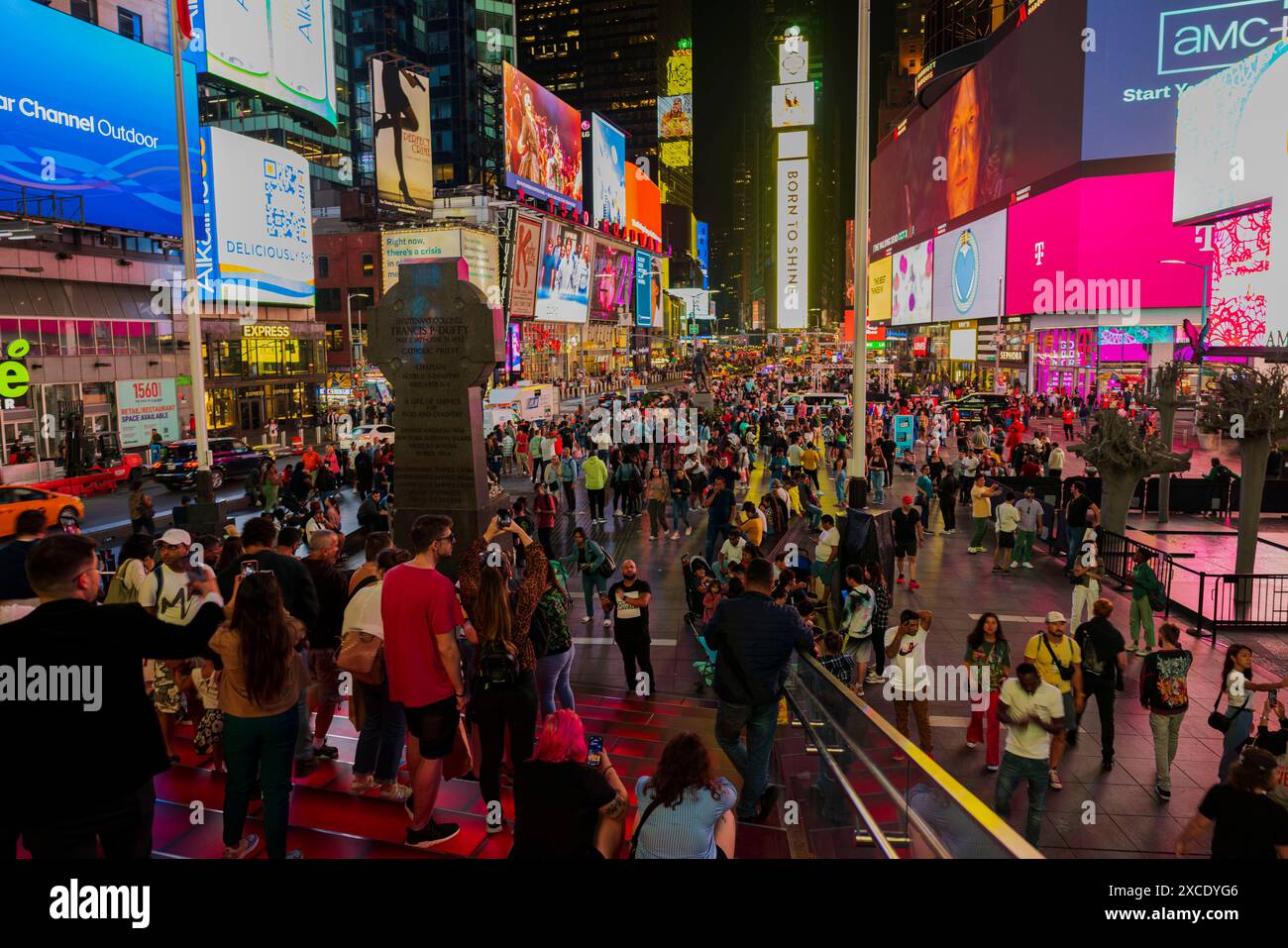 Stunning nighttime view from the Red Steps of Times Square in Manhattan ...