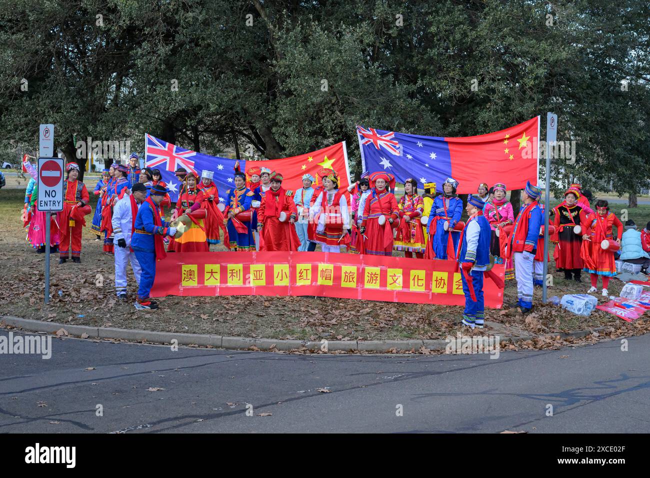 Canberra, Australia. 16th June, 2024. Chinese patriots holding Chinese ...