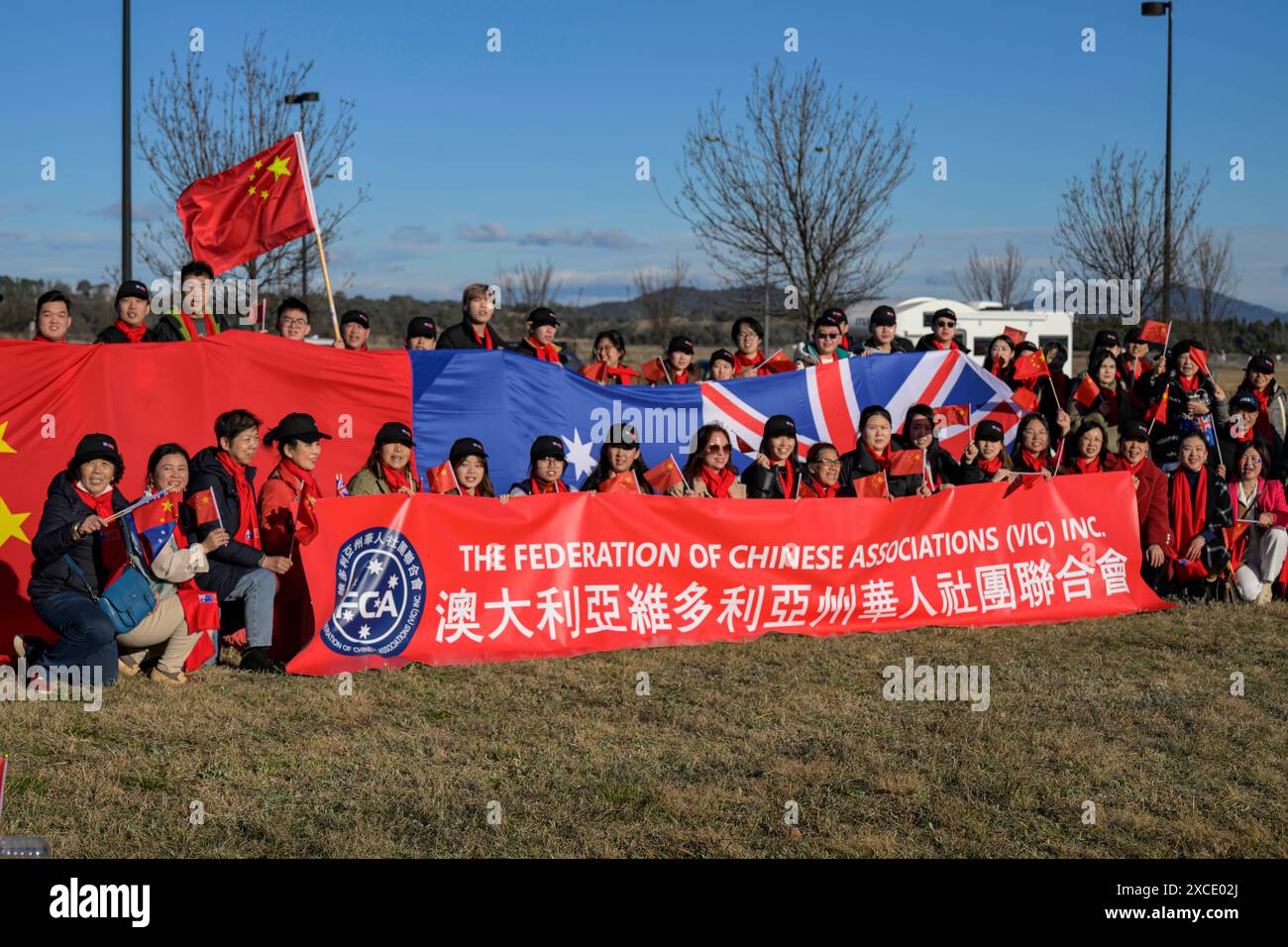 Canberra, Australia. 16th June, 2024. Chinese patriots holding Chinese ...