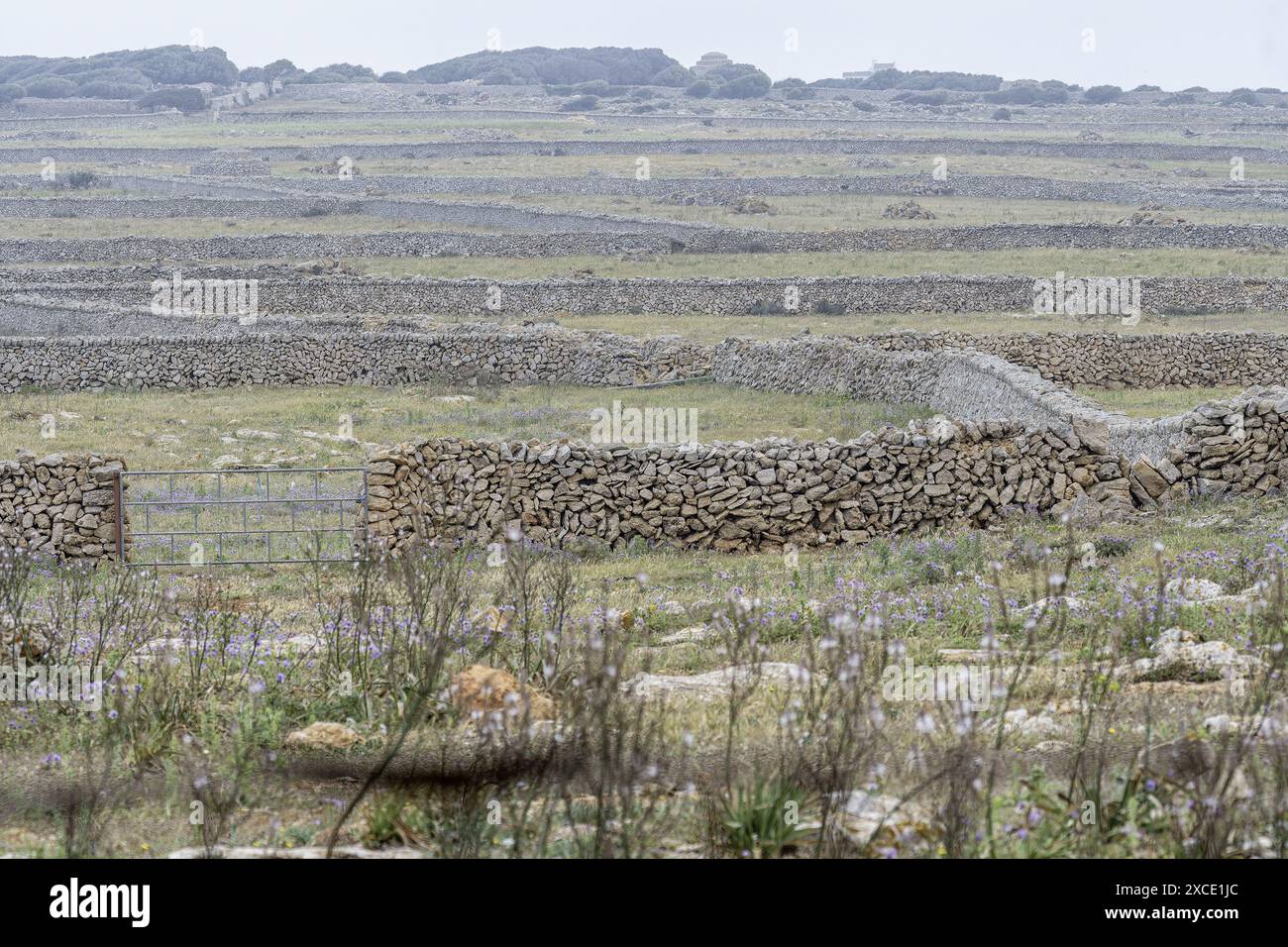 Traditional dry stone constructions at Punta Nati, Menorca. The ...