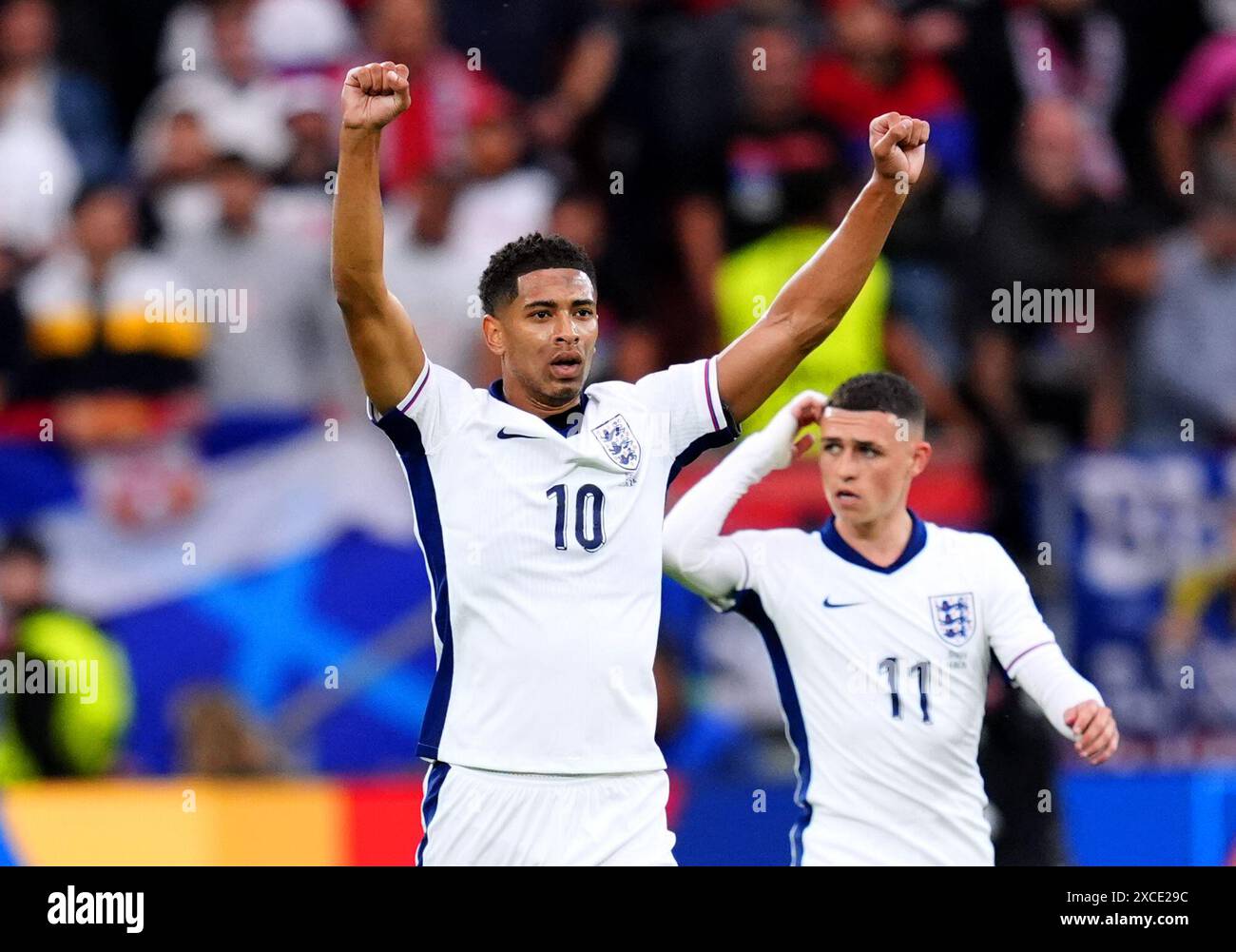 England's Jude Bellingham (left) celebrates scoring their side's first ...