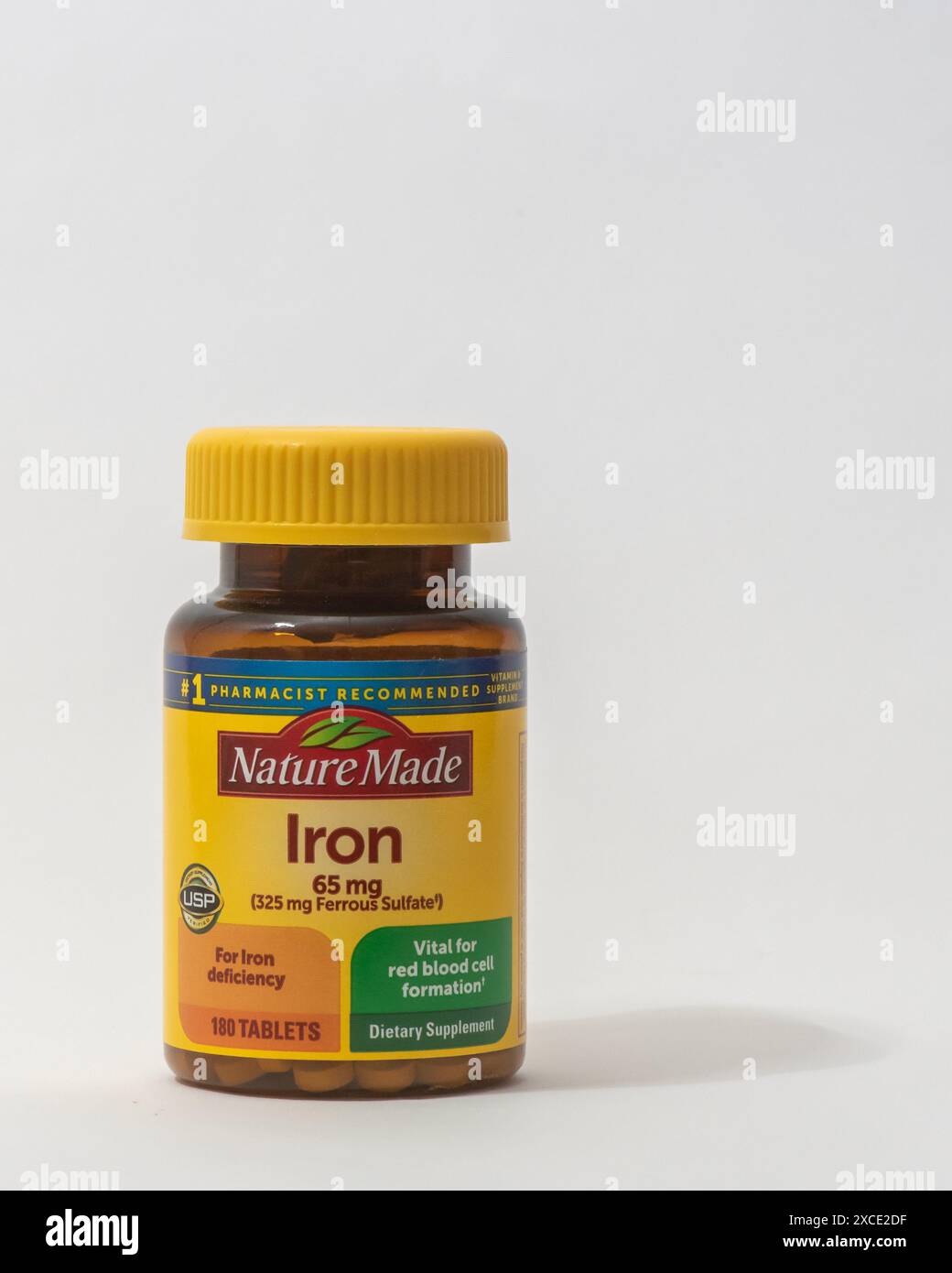 Davis, CA, 11 May, 2024. Bottle of Nature Made Iron supplement on white ...