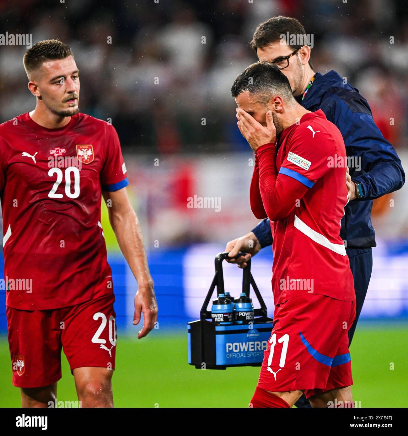 GELSENKIRCHEN - Filip Kostic of Serbia leaves the field with an injury ...