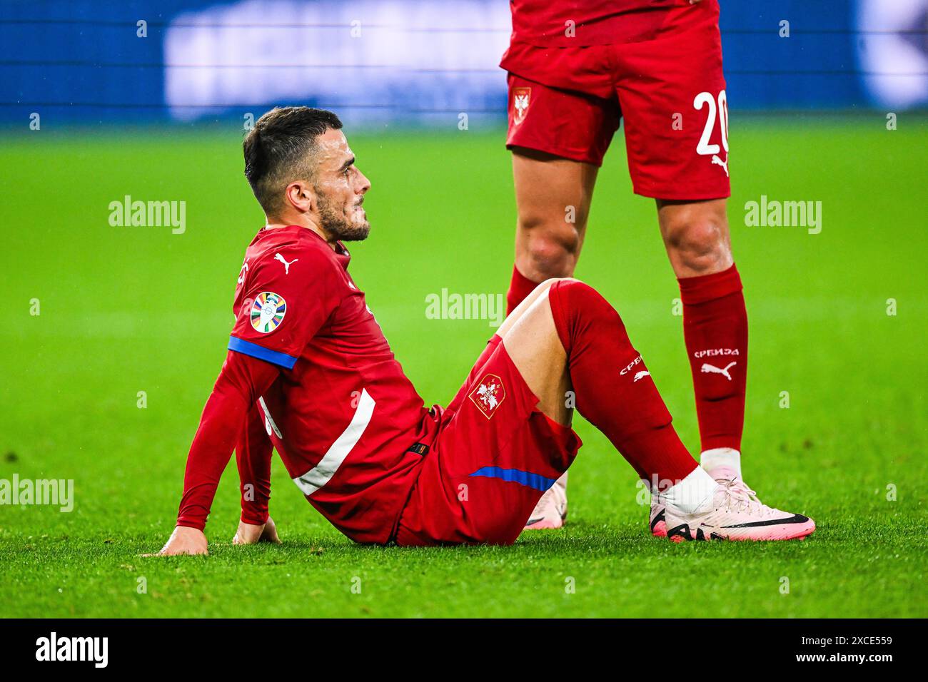 GELSENKIRCHEN - Filip Kostic of Serbia leaves the field with an injury ...