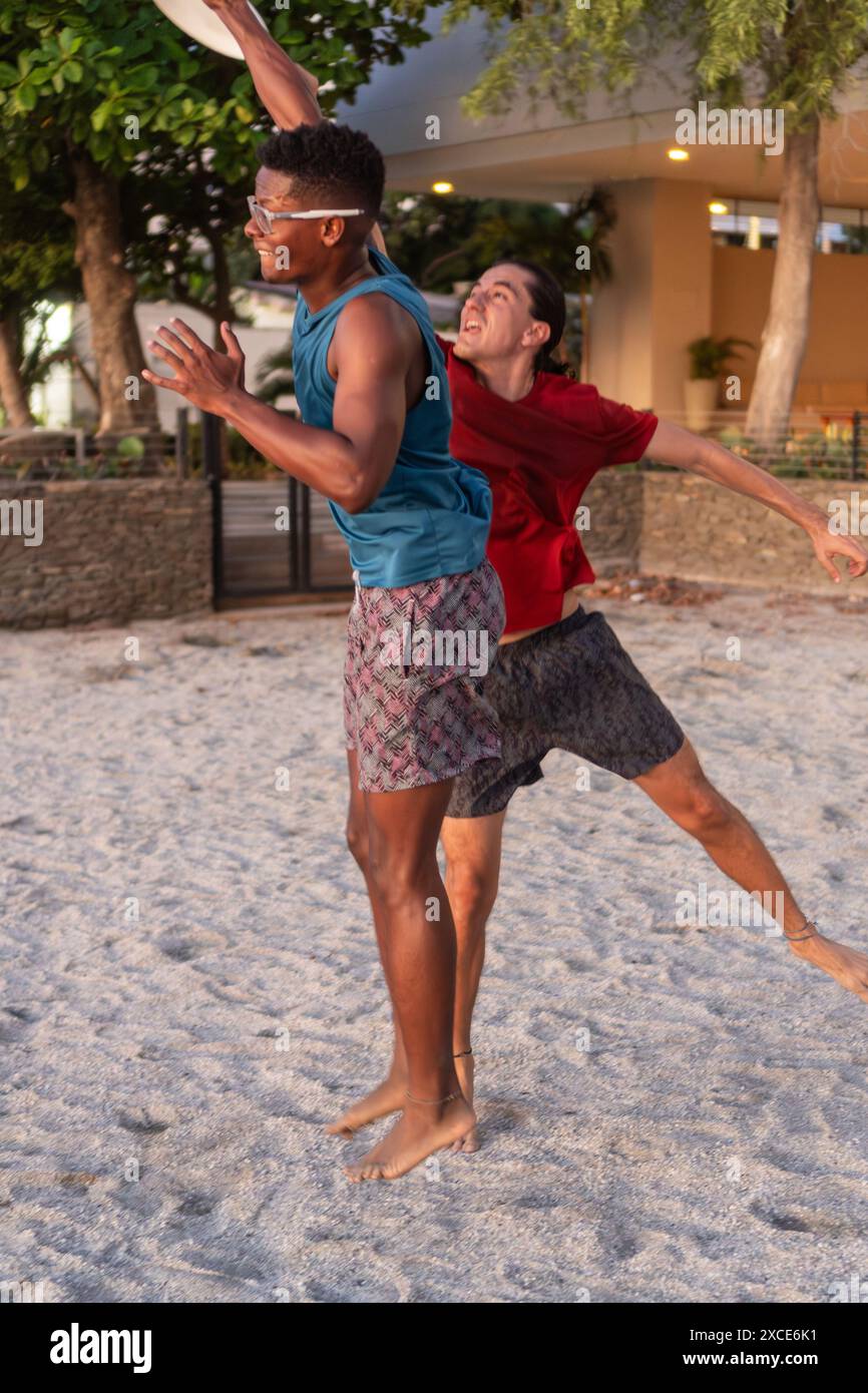 Two young men play frisbee hi-res stock photography and images - Alamy