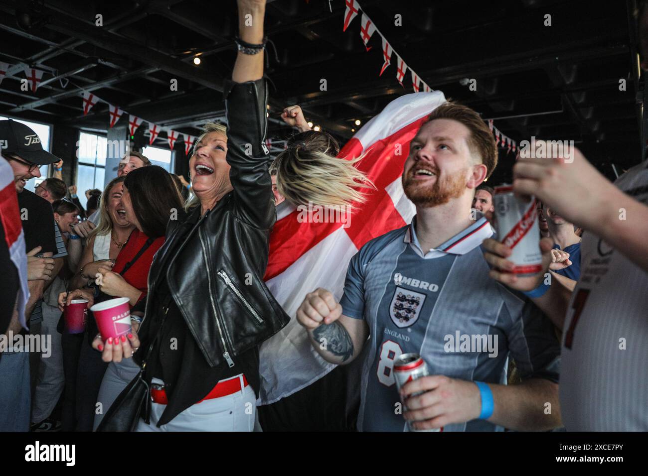 London, UK. 16th June 2024. England fans celebrate as the team lead 1:0 ...