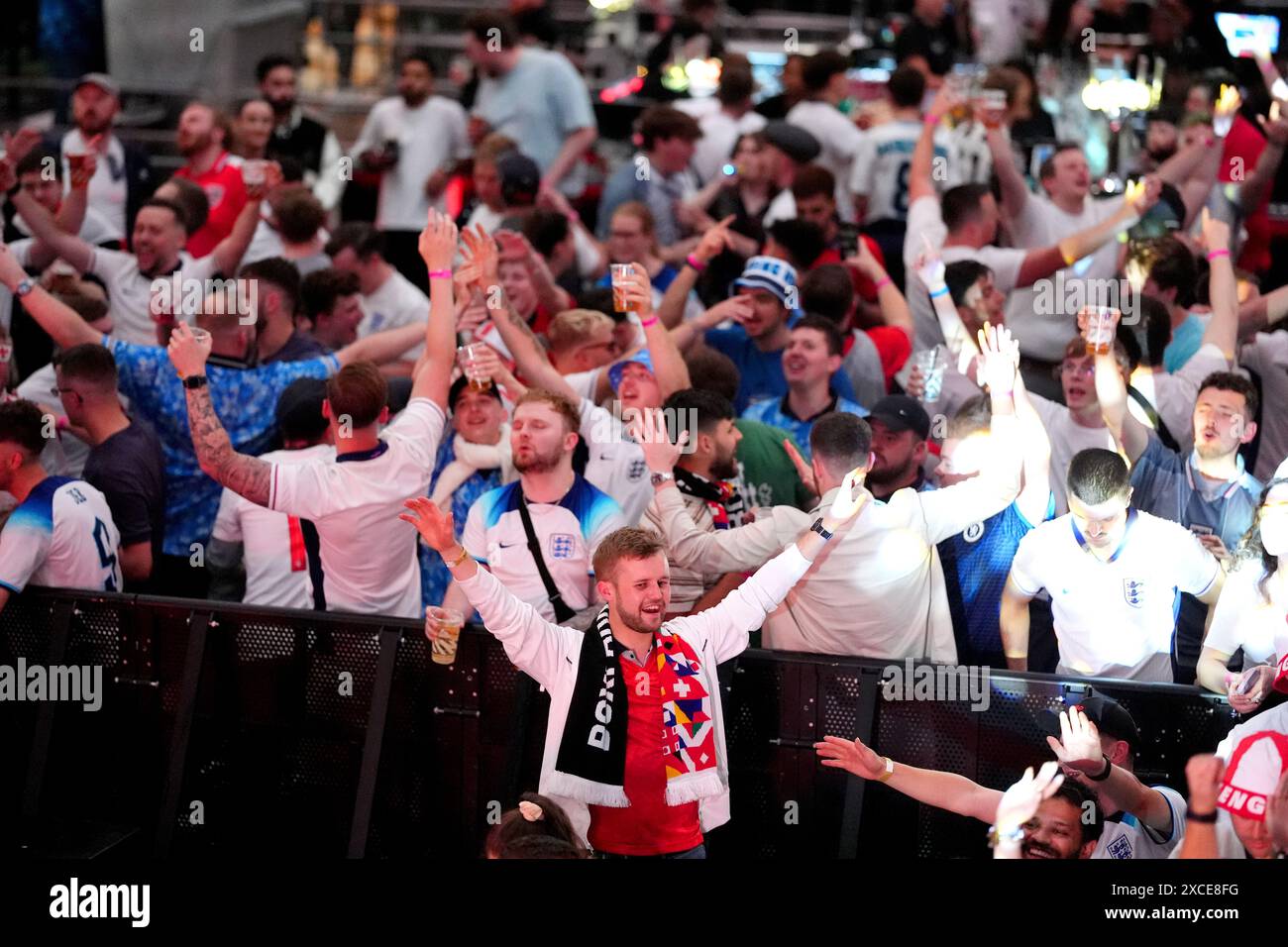 England fans at the BOXPark Wembley in London as they watch a screening ...