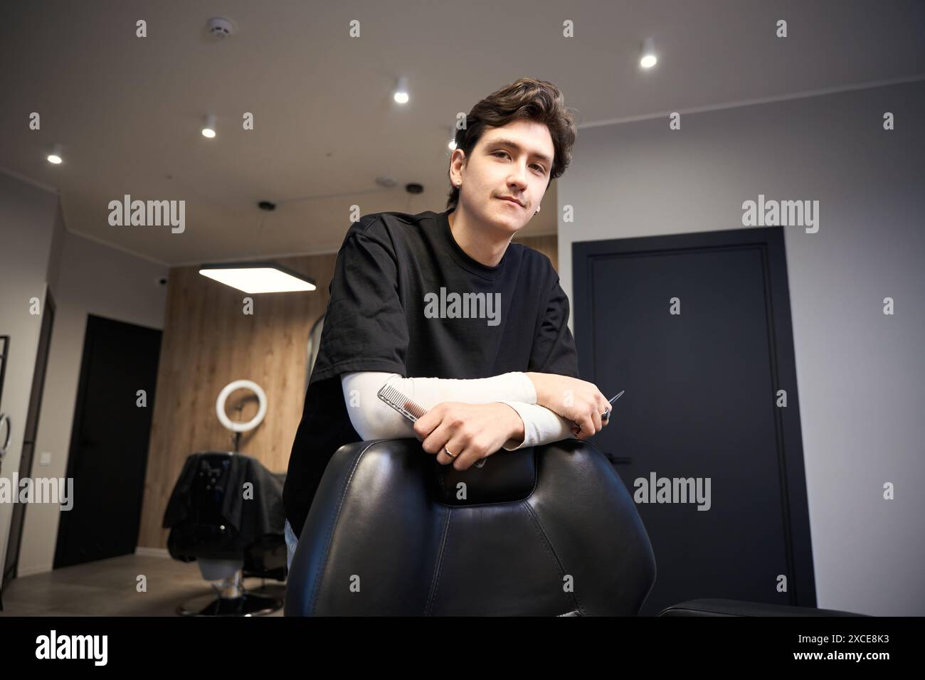 Salon chair pose hi-res stock photography and images - Alamy
