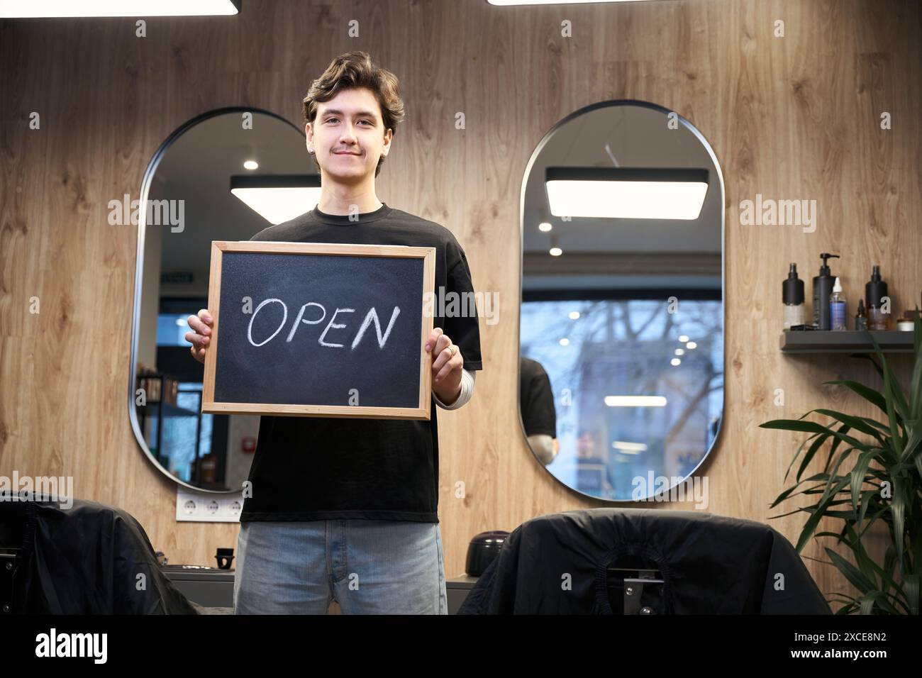 Salon chair pose hi-res stock photography and images - Alamy