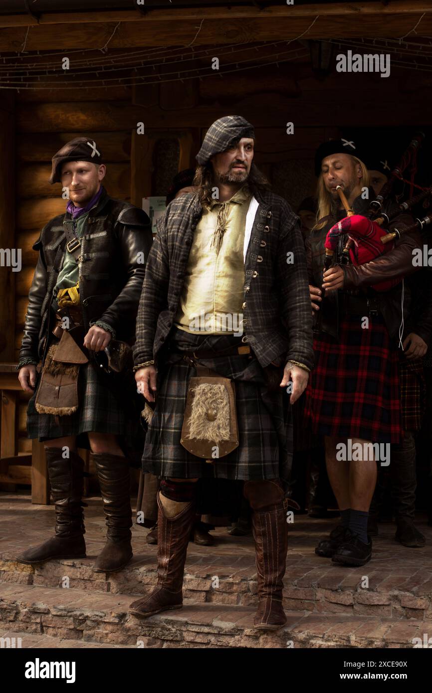 A lord of the Scottish clan with his people Stock Photo - Alamy