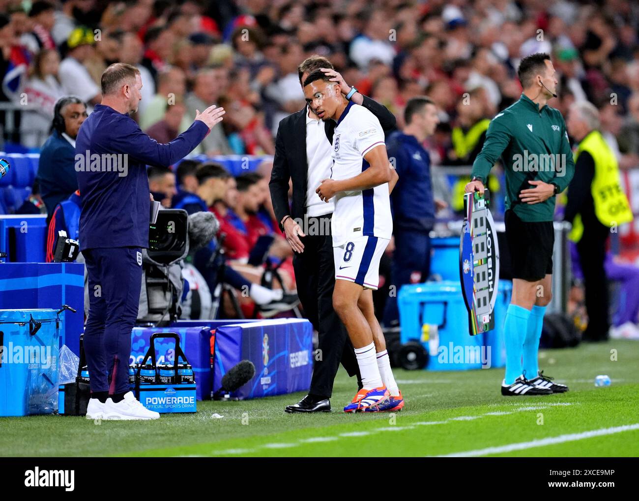England's Trent Alexander-Arnold is hugged by manager Gareth Southgate ...