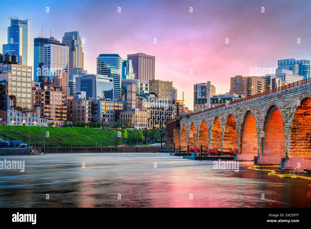 Minneapolis, Minnesota, USA skyline with the Stone Arch Bridge on the ...