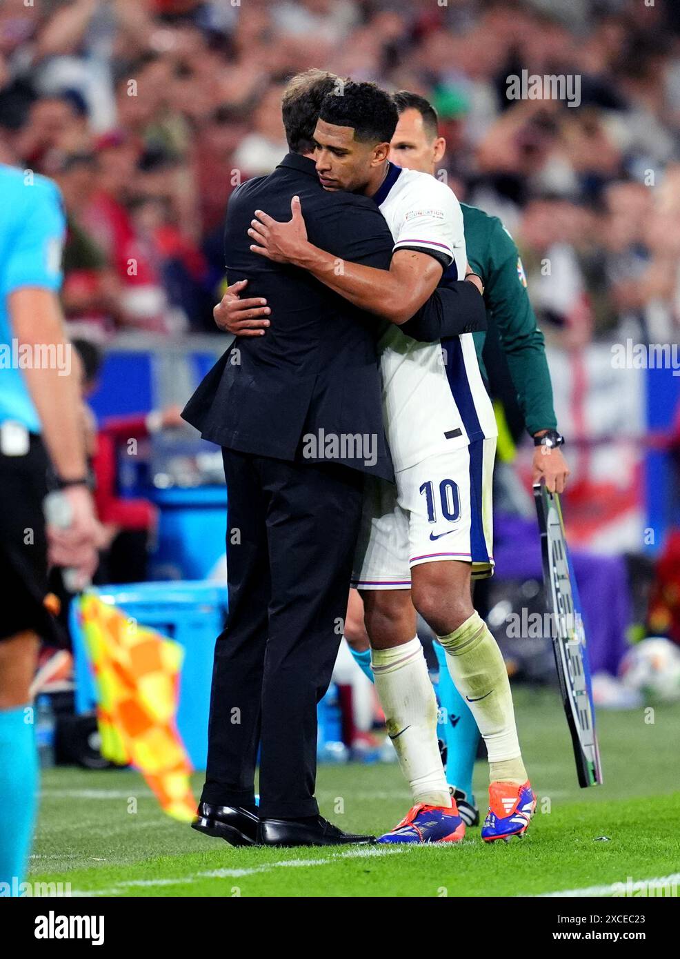 England's Jude Bellingham hugs manager Gareth Southgate after being ...