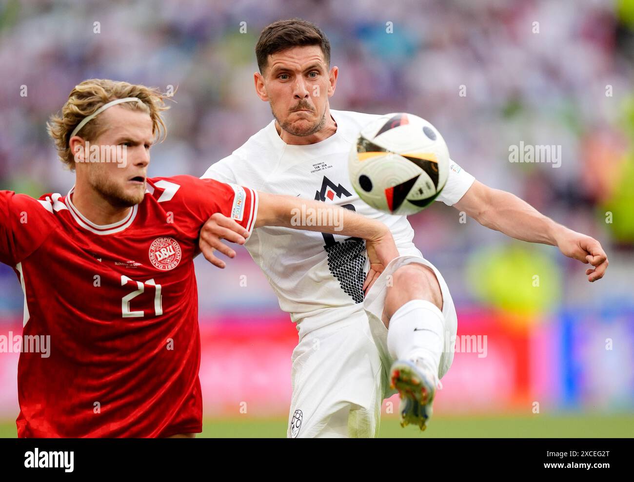 Denmark's Morten Hjulmand (left) and Slovenia's Erik Janza battle for ...