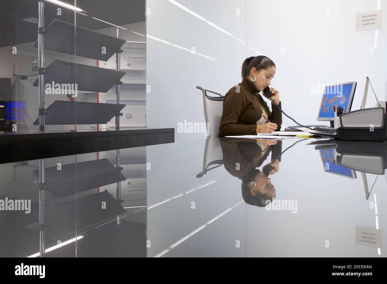 Profile female office receptionist hi-res stock photography and images ...