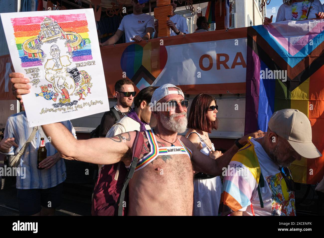 Rome, Italy. 15th June, 2024. A participant holds a placard against ...