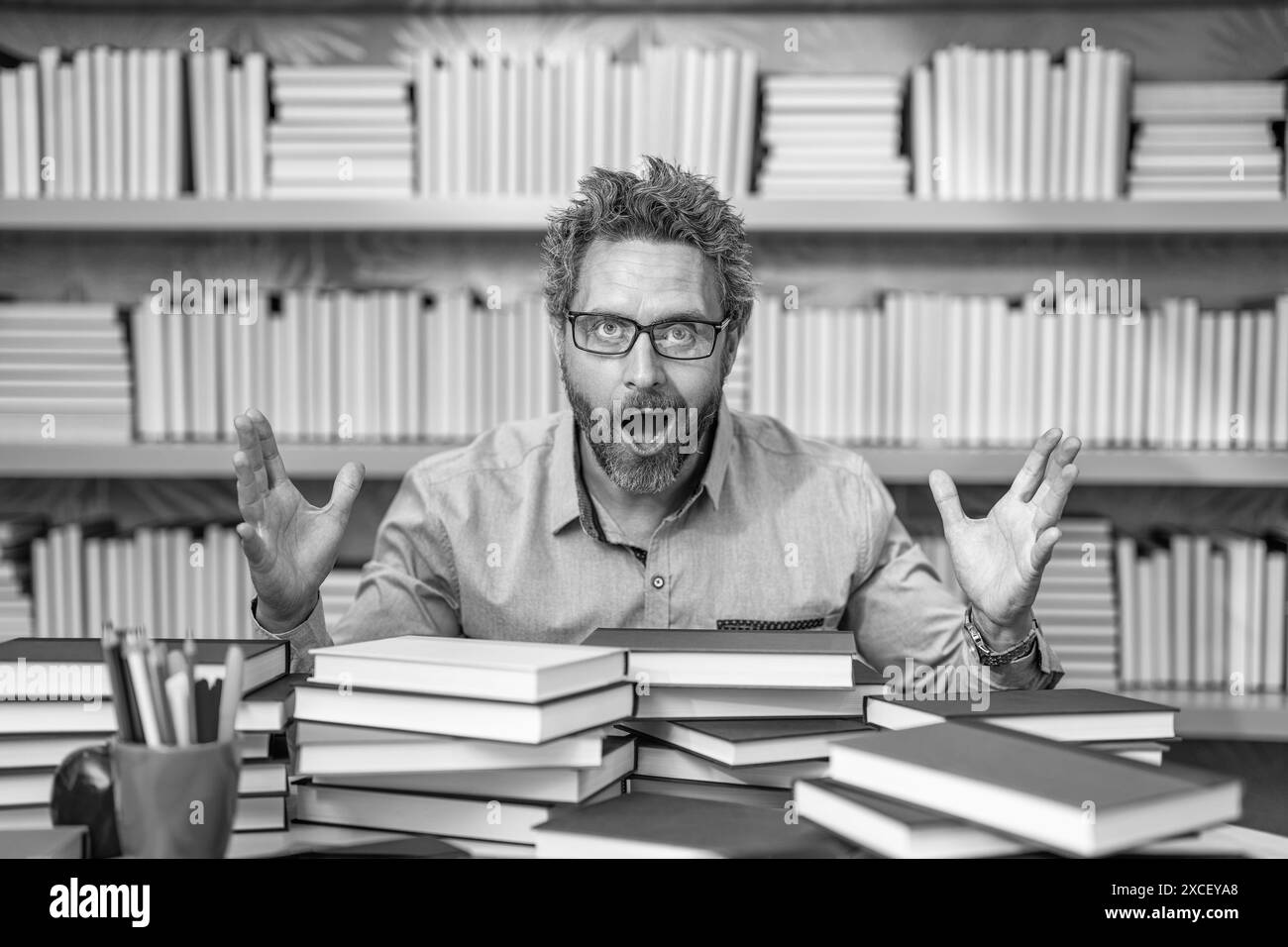 Hispanic teacher in classroom Black and White Stock Photos & Images - Alamy