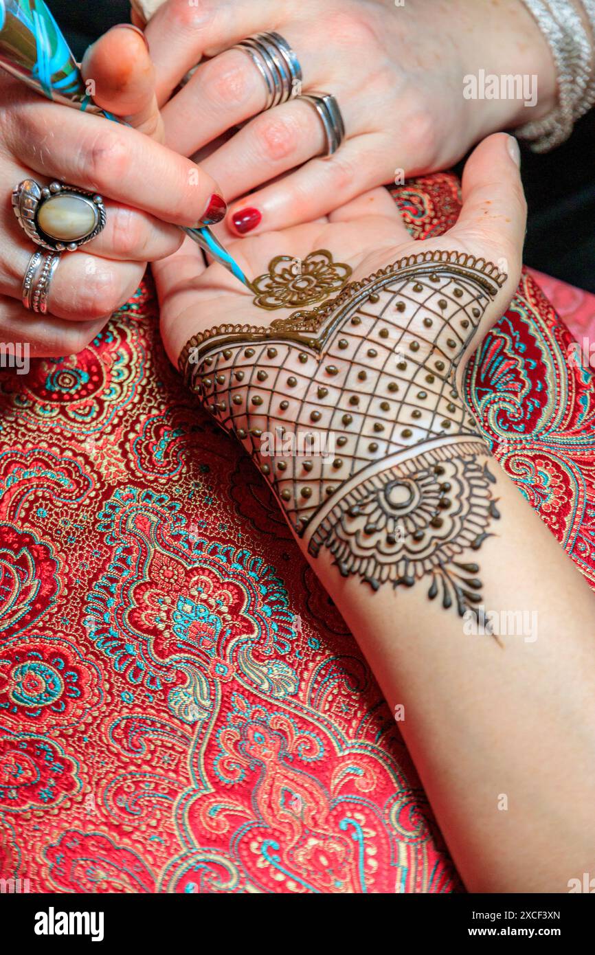 Bride’s Henna party-Seattle WA USA-Very close friends gather in an ...