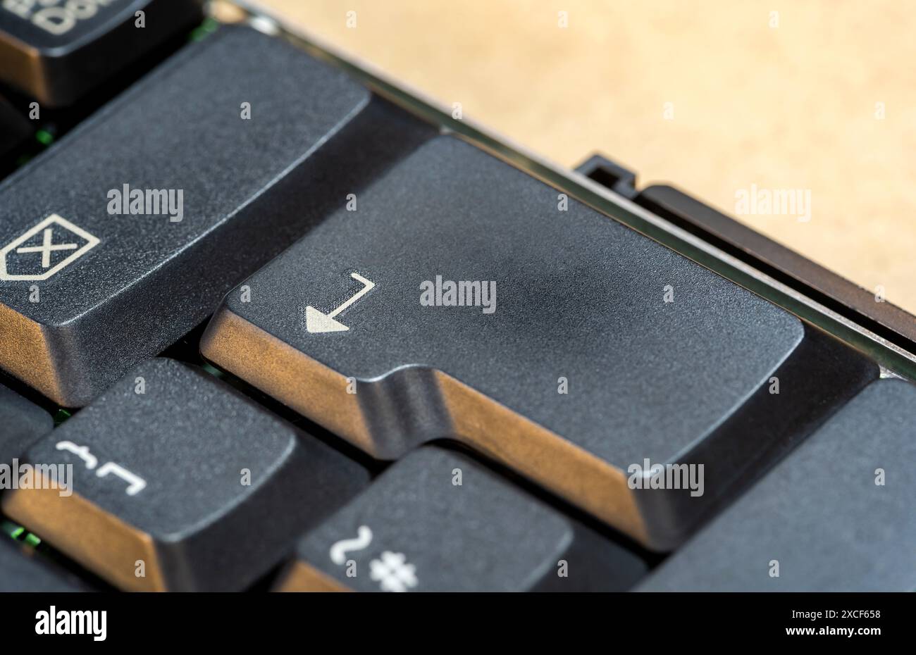 A simple enter key on a laptop computer keyboard, object macro detail ...