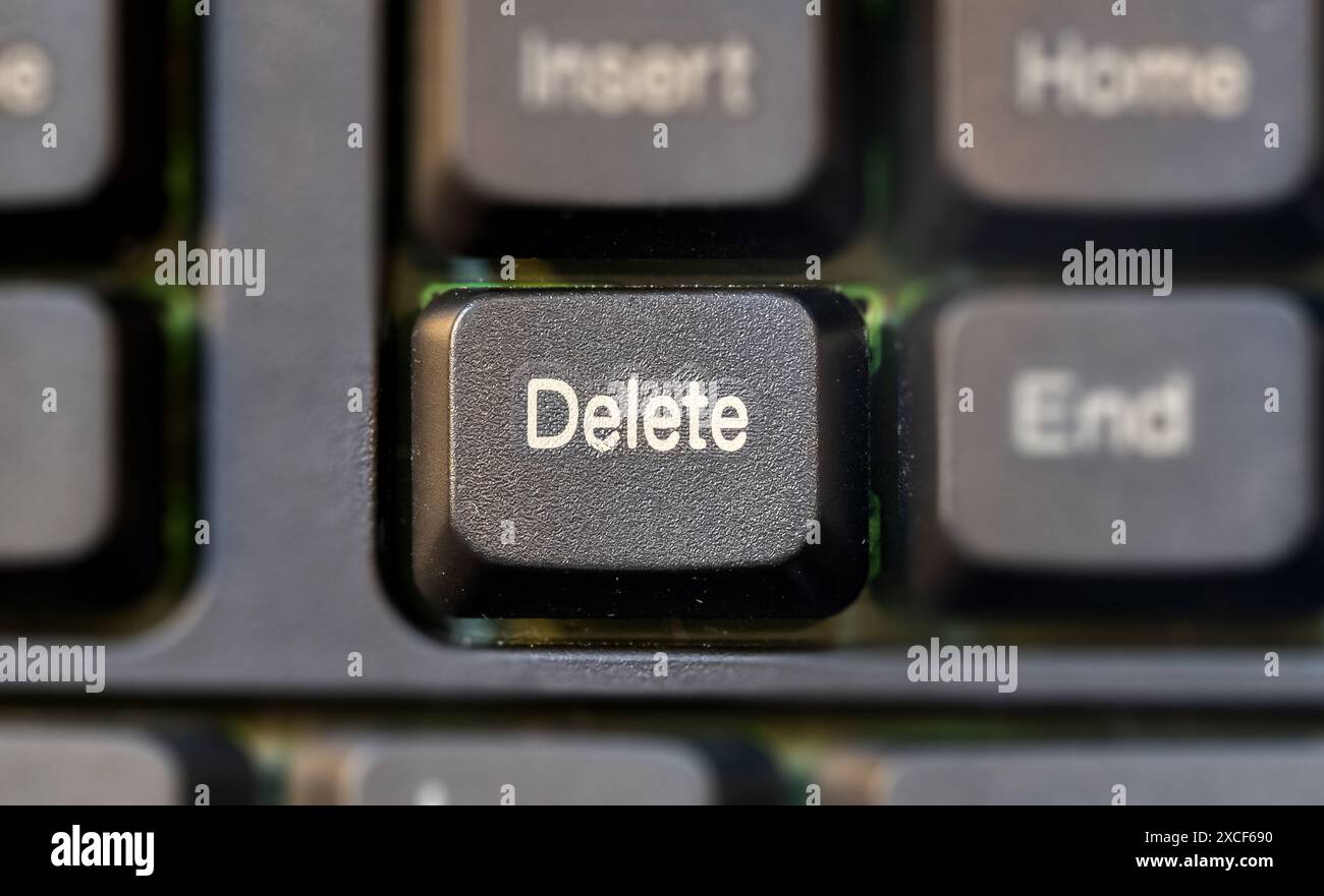 Focus on a single Delete key on a laptop computer keyboard top down ...
