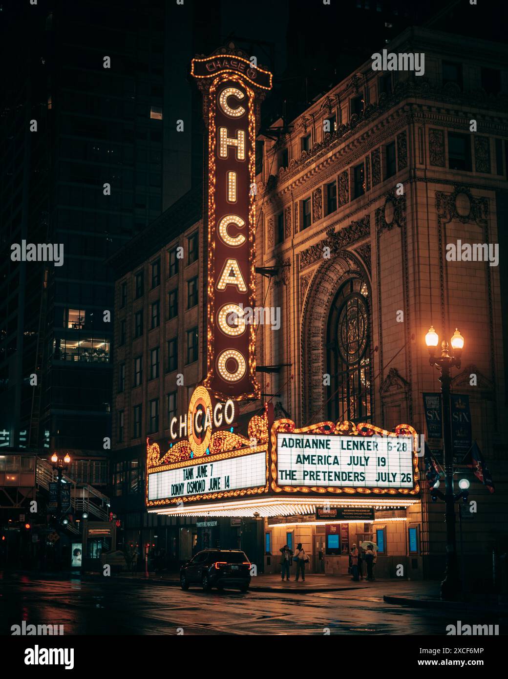 The Chicago Theatre vintage neon sign at night, Chicago, Illinois Stock ...