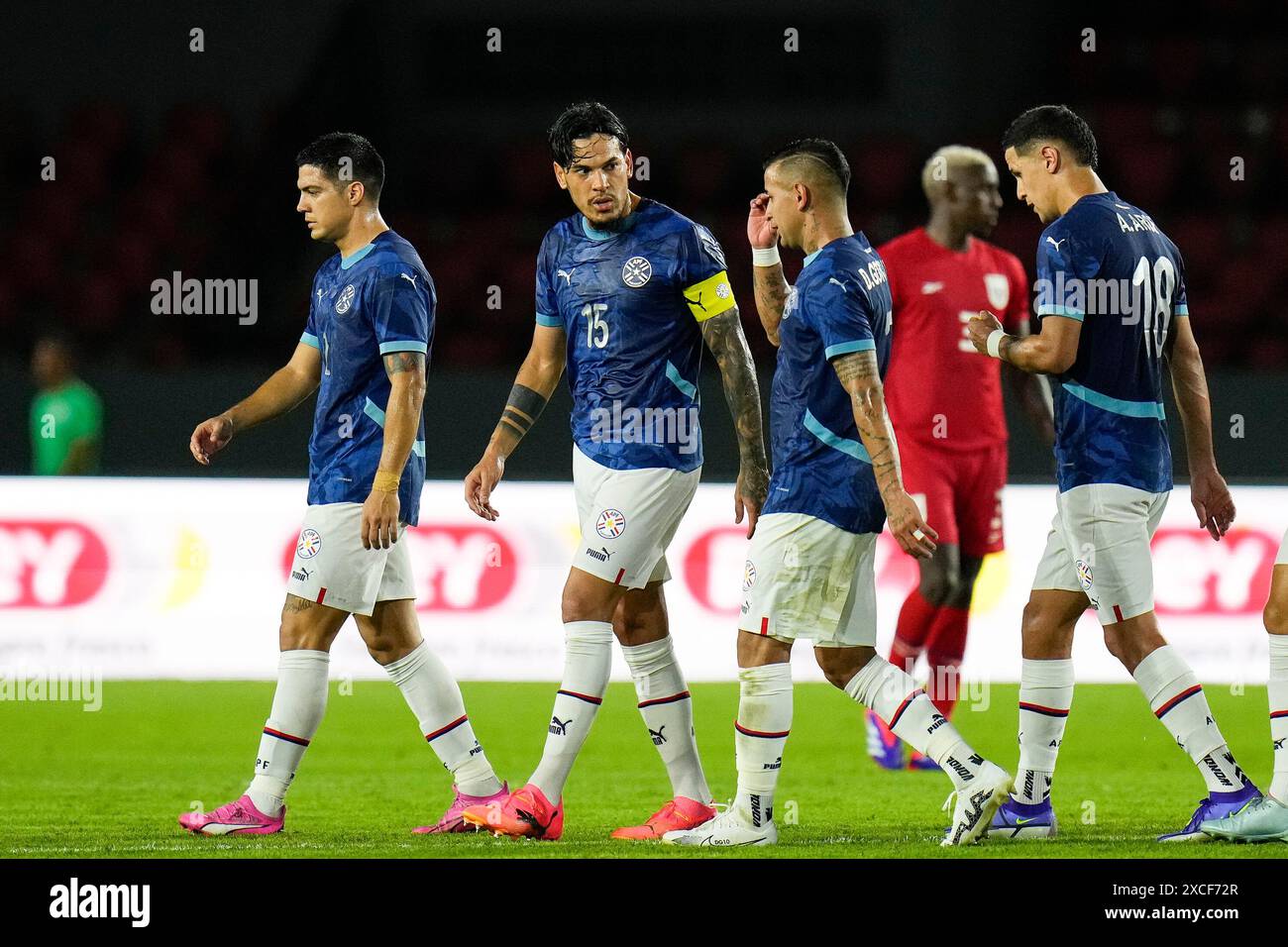 Paraguayan captain Gustavo Gomez, second from left, talks with ...