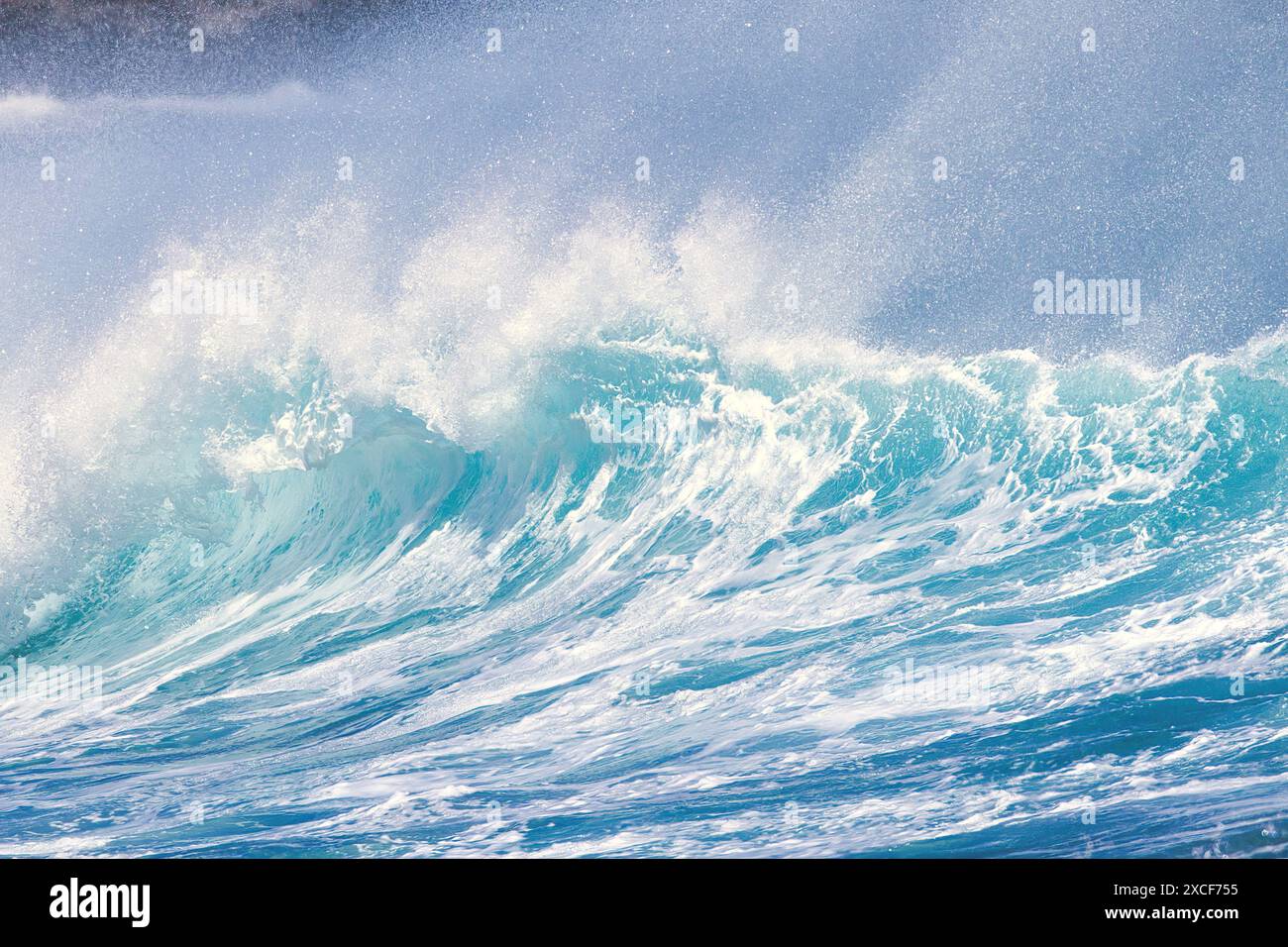 Powerful breaking wave on Maui Stock Photo - Alamy