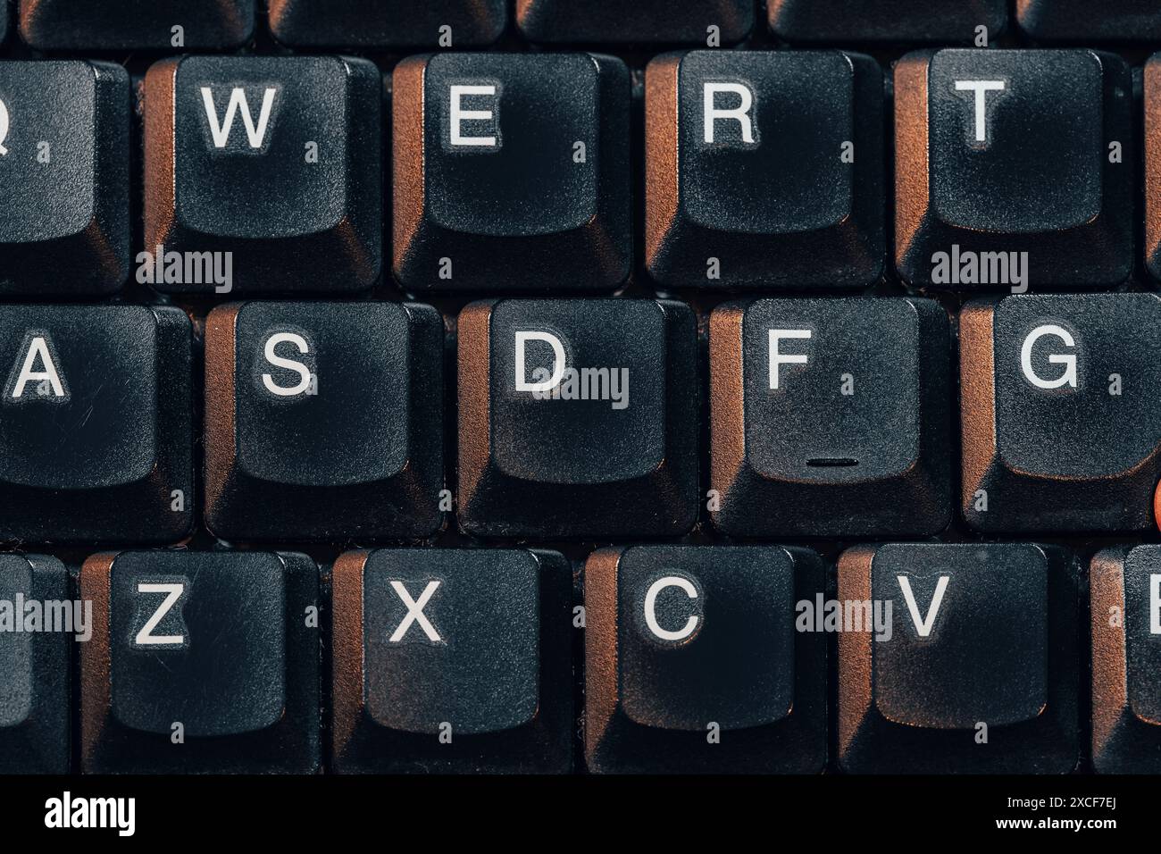 Old retro style aesthetic laptop computer keyboard with thick keys, top ...