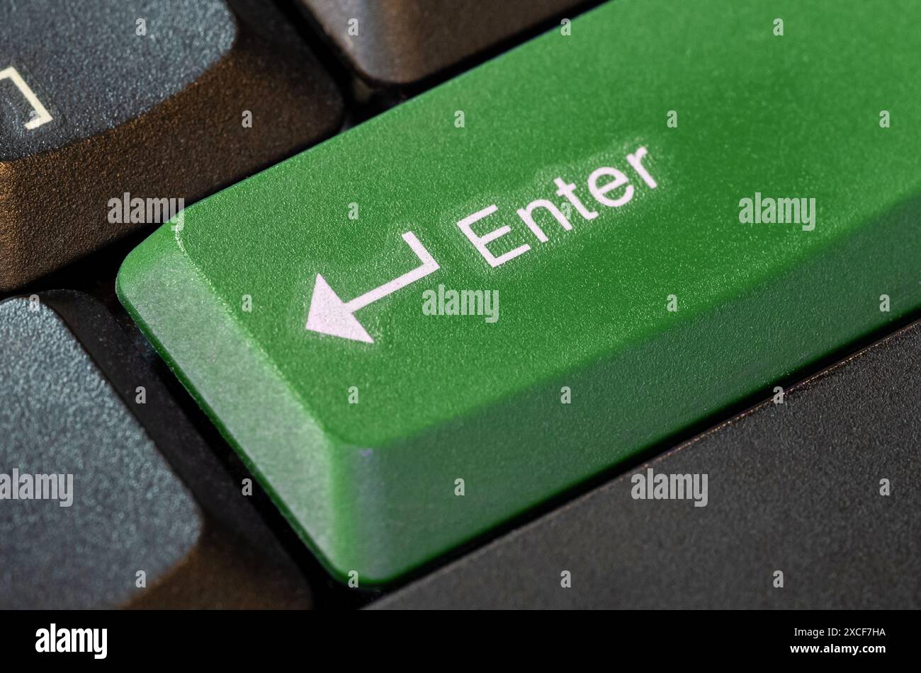 Green enter key on a computer keyboard, object macro detail extreme ...