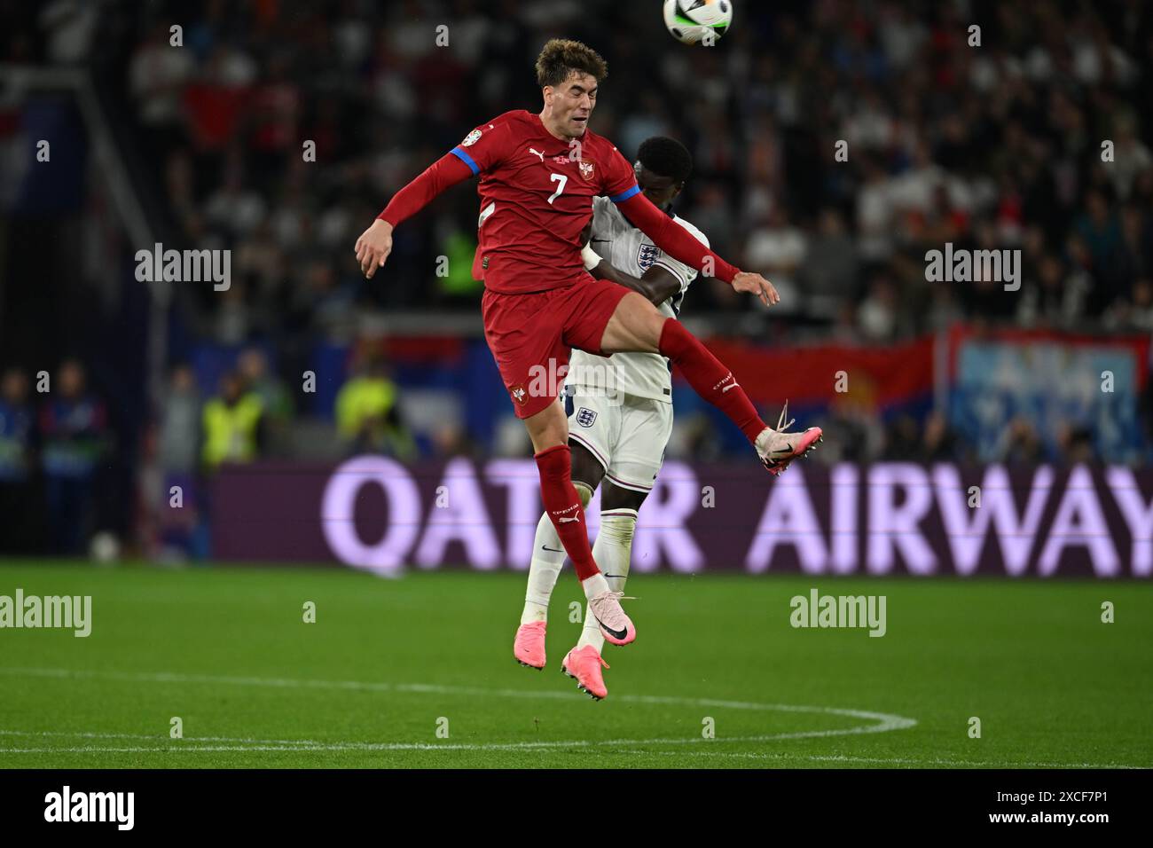 Dusan Vlahovic (Serbia)Marc Guehi (England) during the UEFA Euro Germany 2024 match between ...