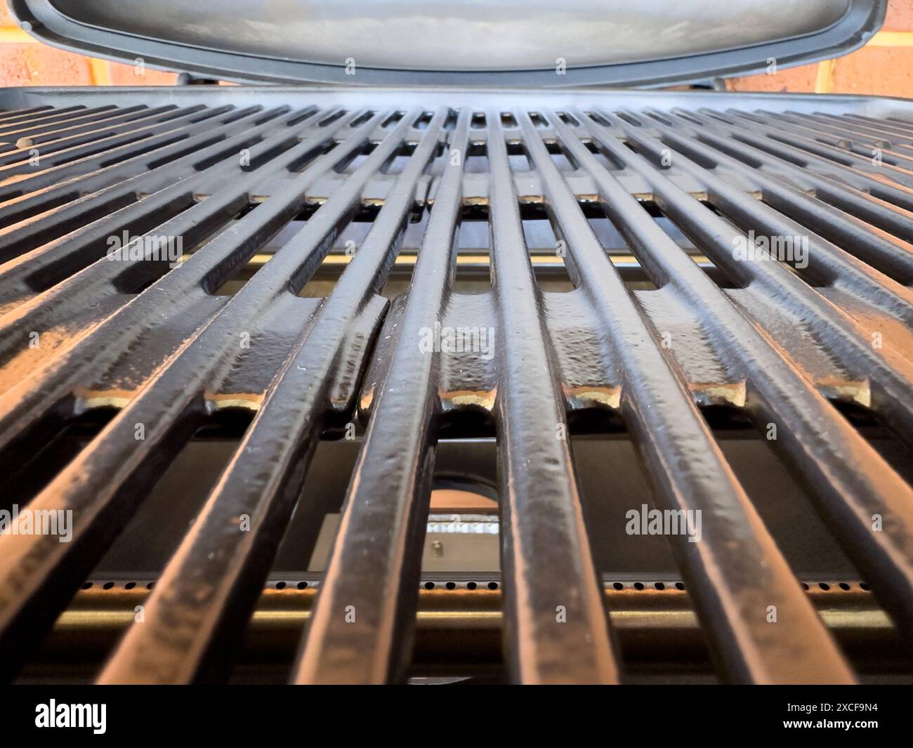 Brand new barbecue, barbeque or BBQ grill plates as grilling background ...