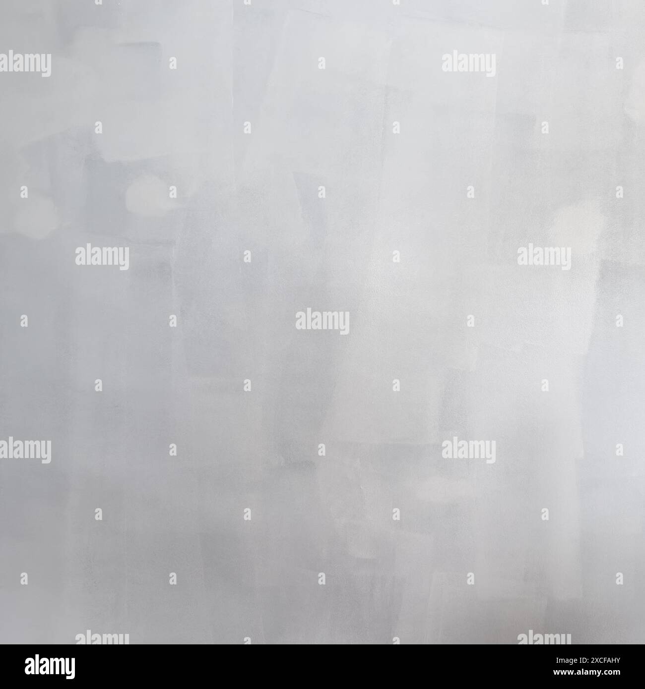 Completely blank freshly roller painted white wall with patchy marks in ...