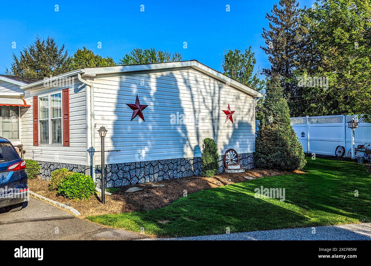 A Charming White Mobile, Manufactured, Prefab Home With Red Star ...