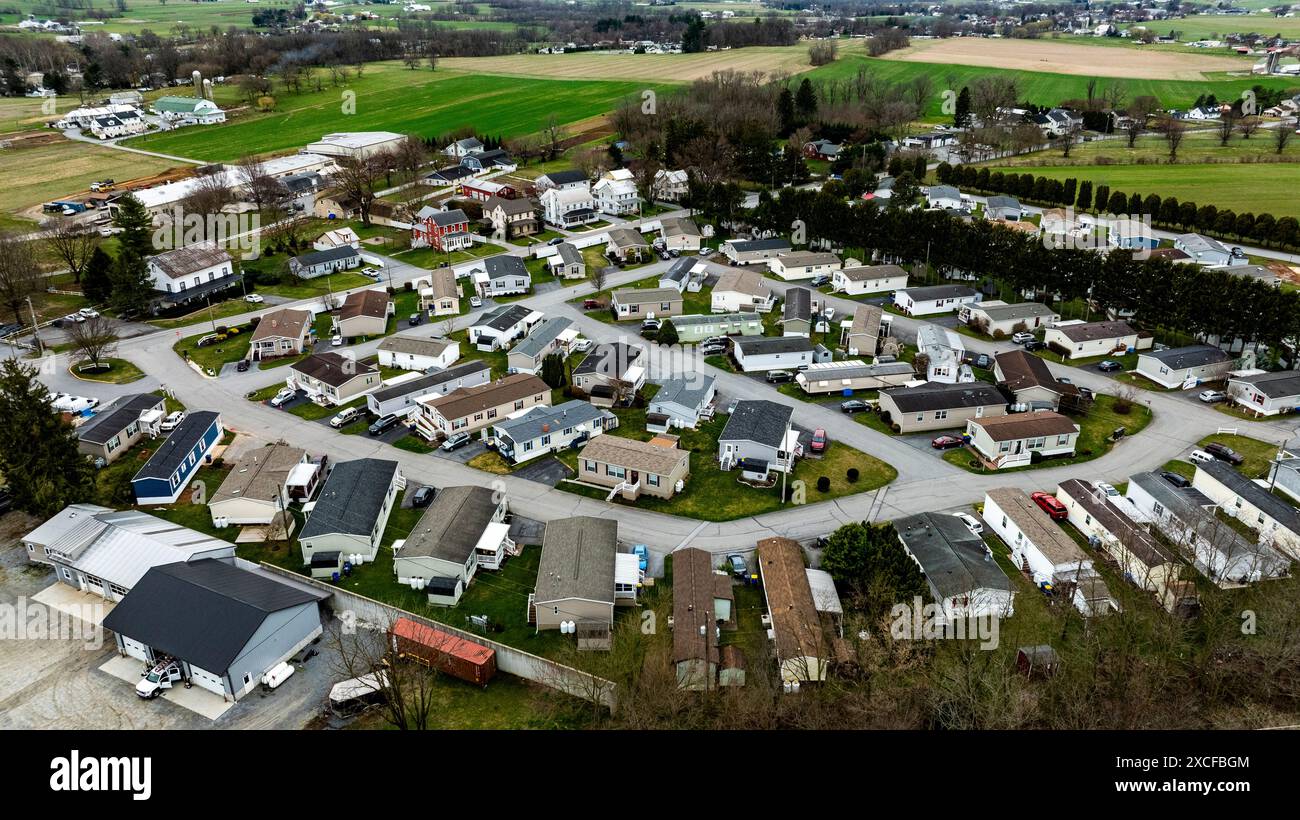Aerial View Of A Compact Suburban Neighborhood With Rows Of Mobile ...