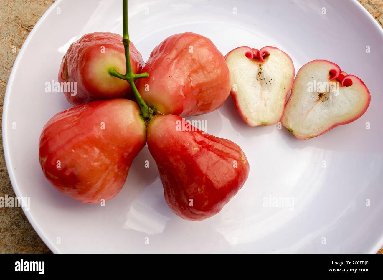 Whole and Cut Ripe Exotic Royal Apple Stock Photo - Alamy