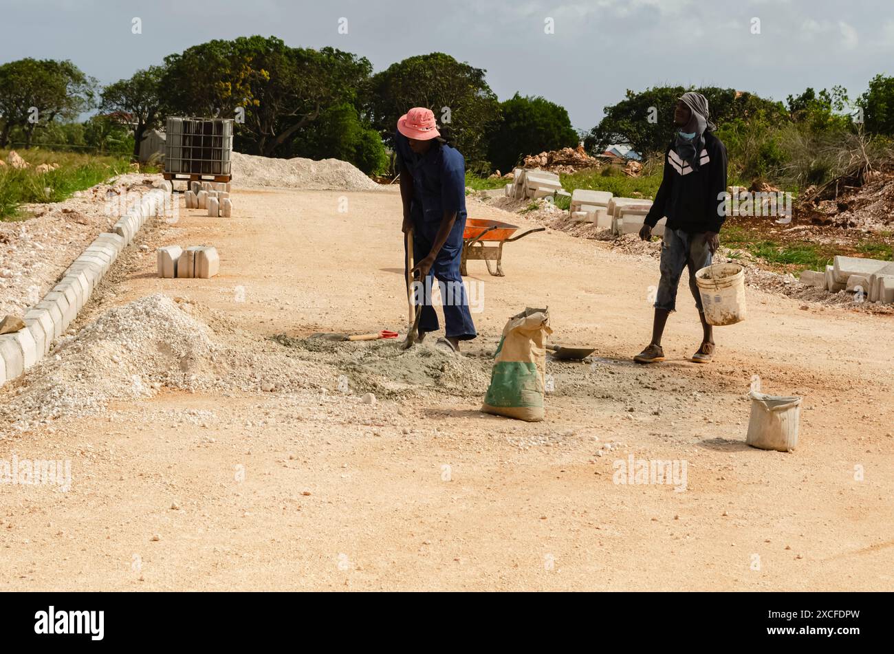 Men Mixing Mortar On Road Construction Site Stock Photo - Alamy