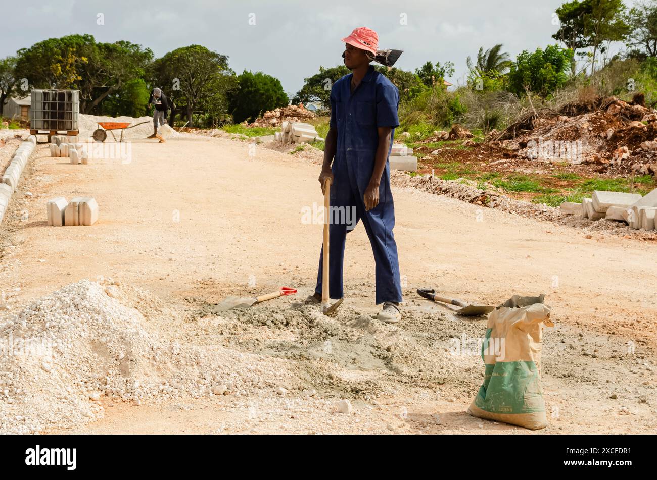 Men Mixing Mortar On Road Construction Site Stock Photo - Alamy