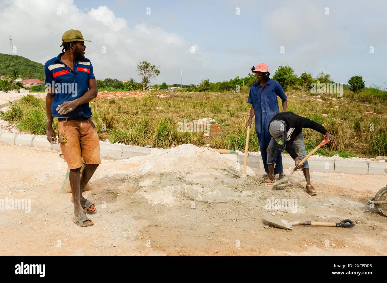 Men Mixing Mortar On Road Construction Site Stock Photo - Alamy