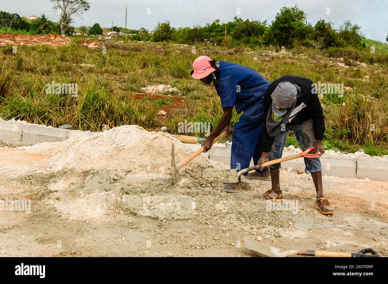 Men Mixing Mortar On Road Construction Site Stock Photo - Alamy