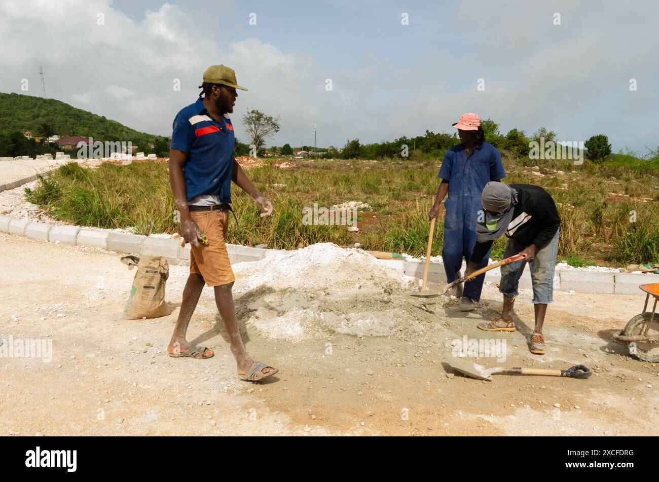 Men Mixing Mortar On Road Construction Site Stock Photo - Alamy