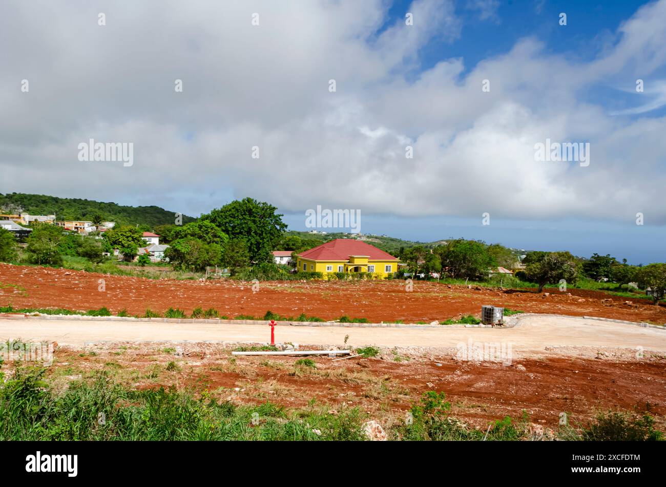 Red soil houses hi-res stock photography and images - Alamy
