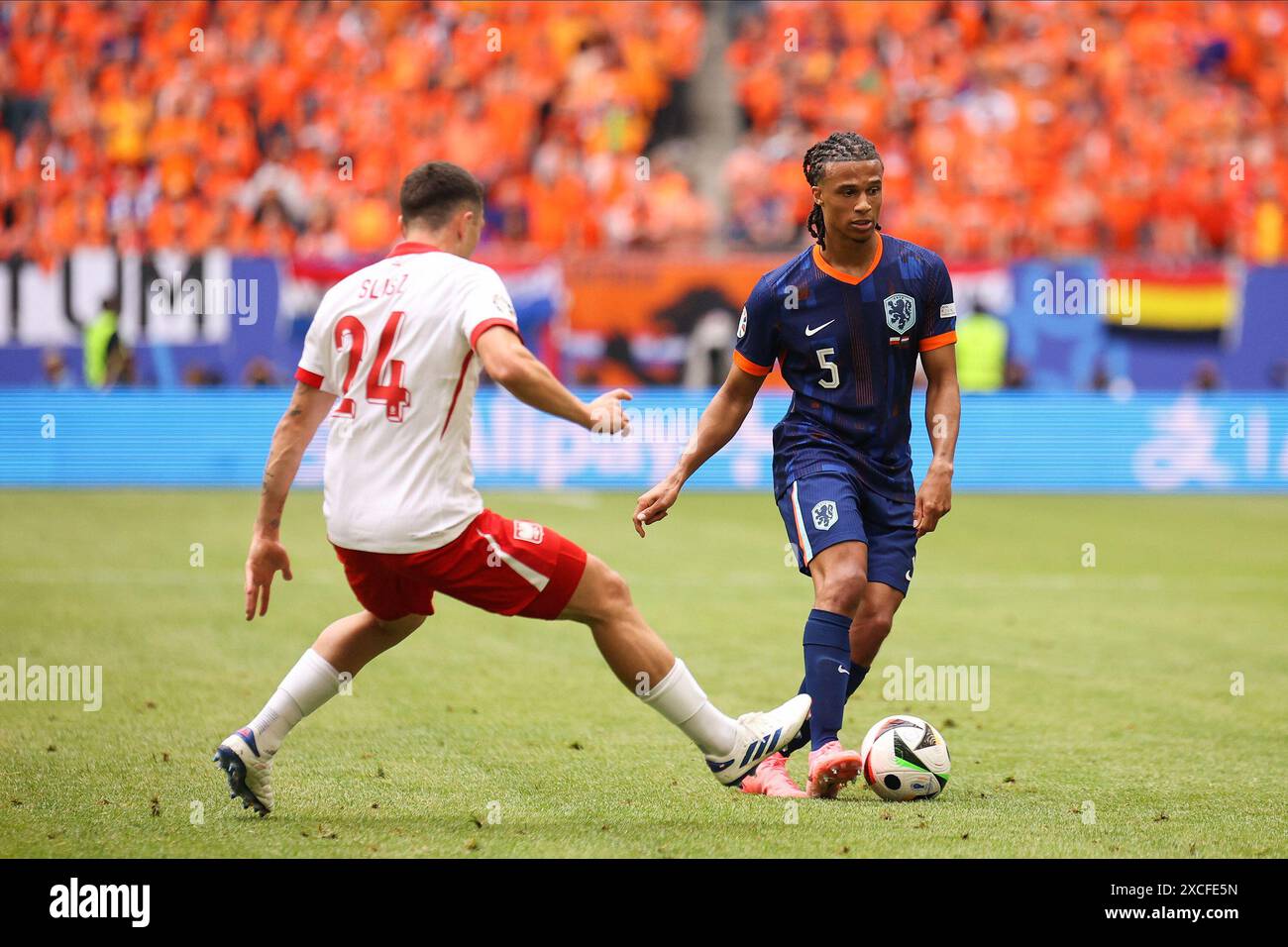 Nathan Aké (R) of Netherlands and Bartosz Slisz (L) of Poland in action ...