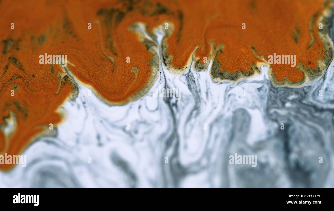 Paint spill. Glitter fluid wave. Defocused white gray orange color ...