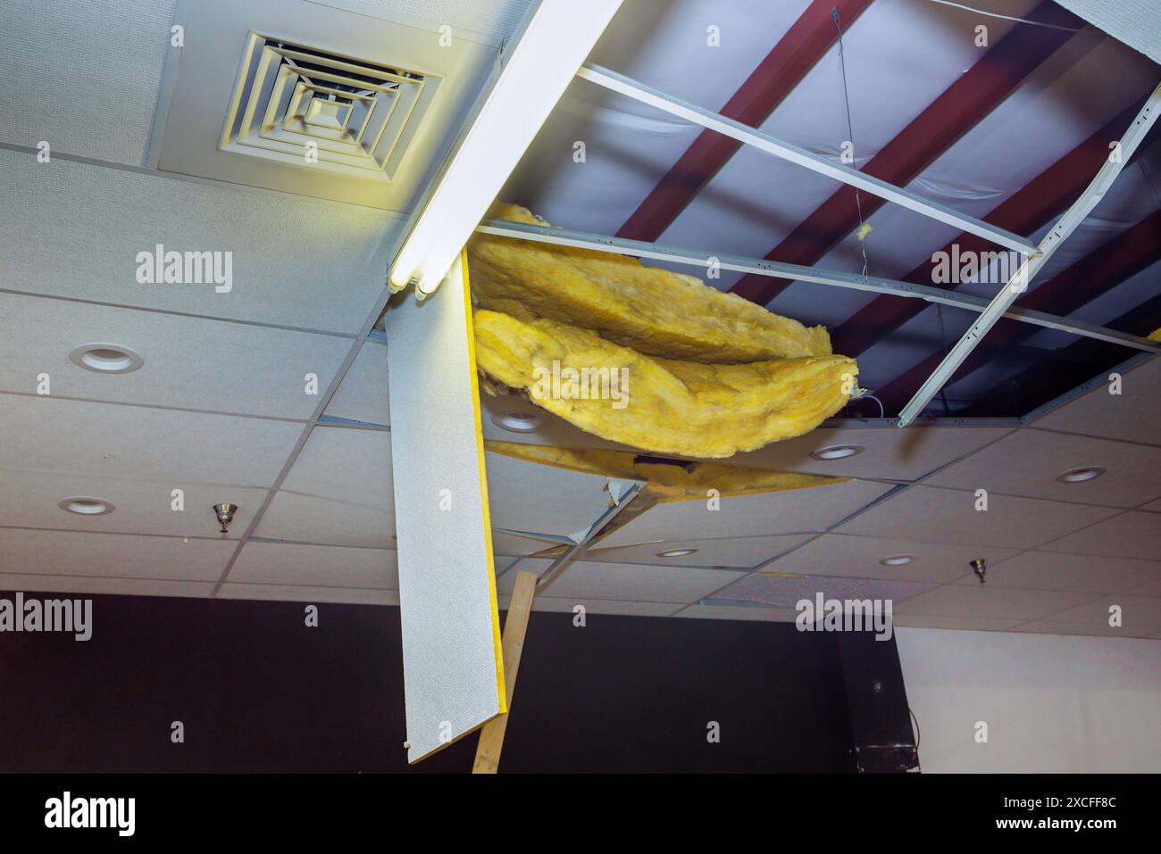 Damaged ceilings are demolitions during renovations of commercial ...