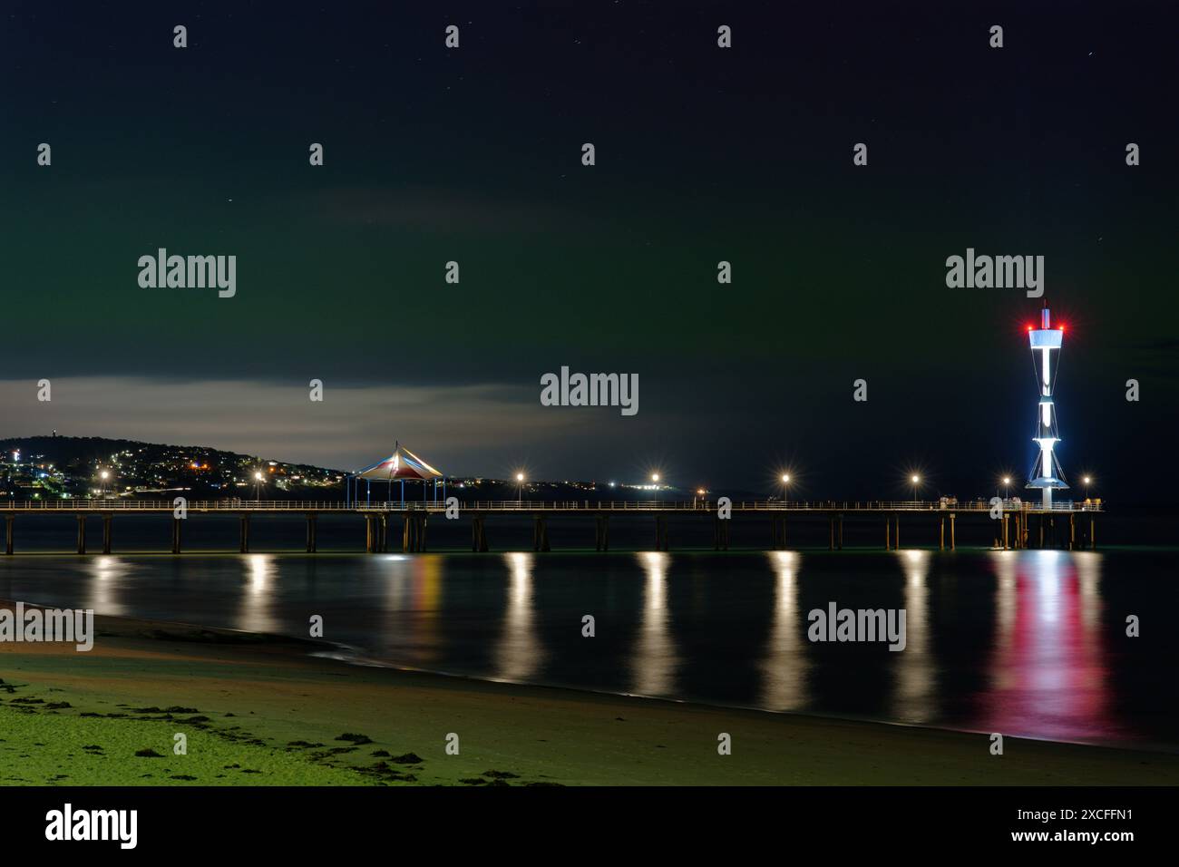 Brighton Jetty at night being illuminated by Aurora Australis Stock ...