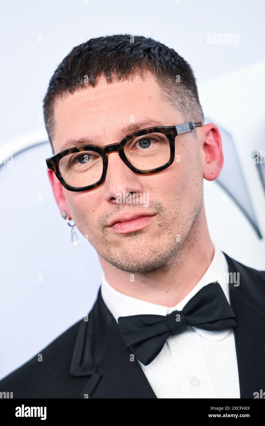 Tom Scutt walking on the red carpet at the 77th Annual Tony Awards held ...