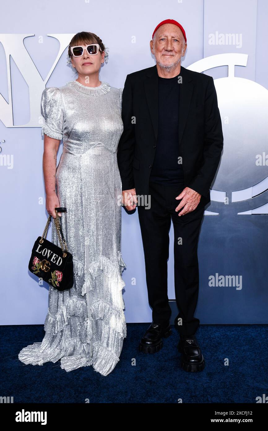Rachel Fuller and Pete Townshend walking on the red carpet at the 77th ...