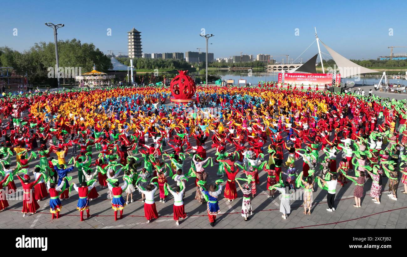 KORLA, CHINA - JUNE 17, 2024 - A large number of citizens dressed in ...